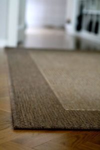 How To Fix a Curling Rug Corner - Curbly