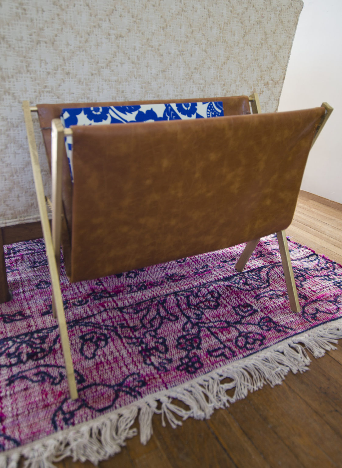 How to: Repurpose an Old Drying Rack into a Stylish Magazine Rack - Curbly