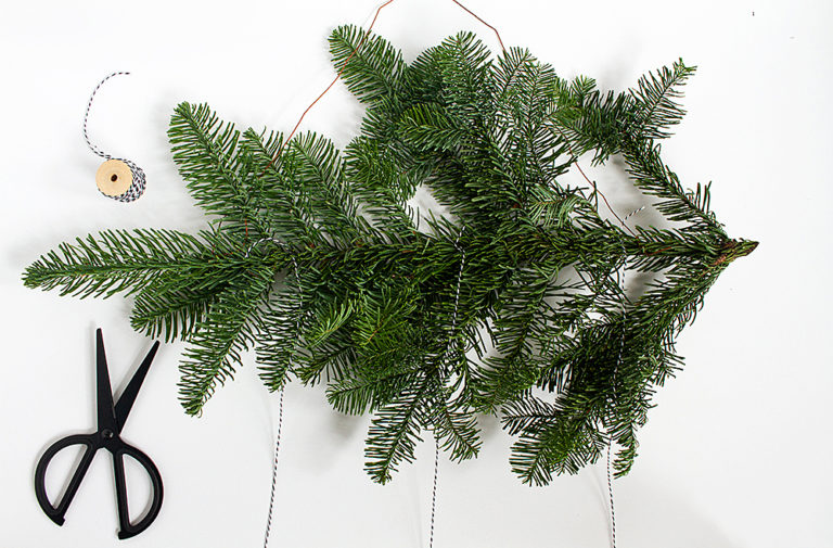 This DIY branch holiday card display shows off your cards in style